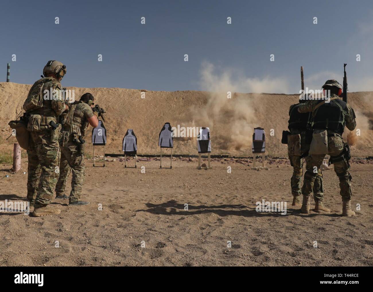 Soldiers assigned to 3rd Special Forces Group (Airborne) shoot ...