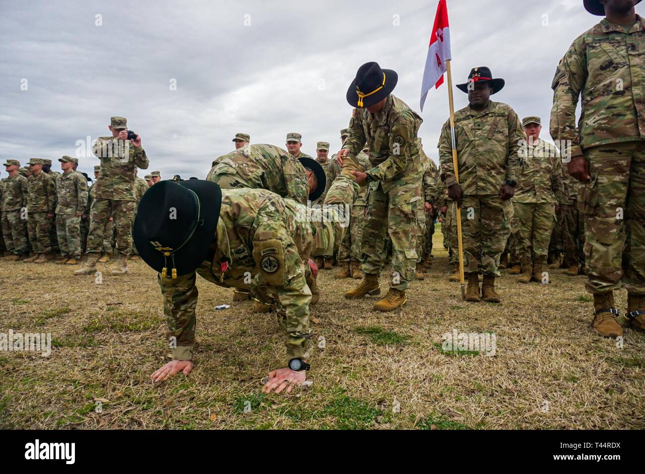 Command Sgt. Maj. Joey Ruiz awards gold combat spurs to Capt. Samuel ...