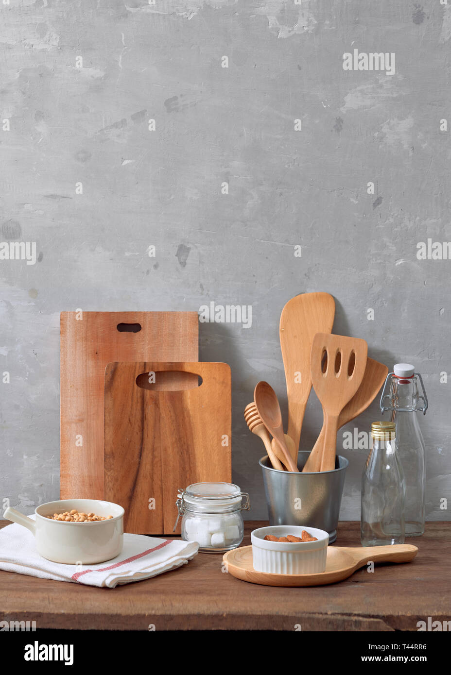 Kitchen still life with nuts and utensils Stock Photo - Alamy