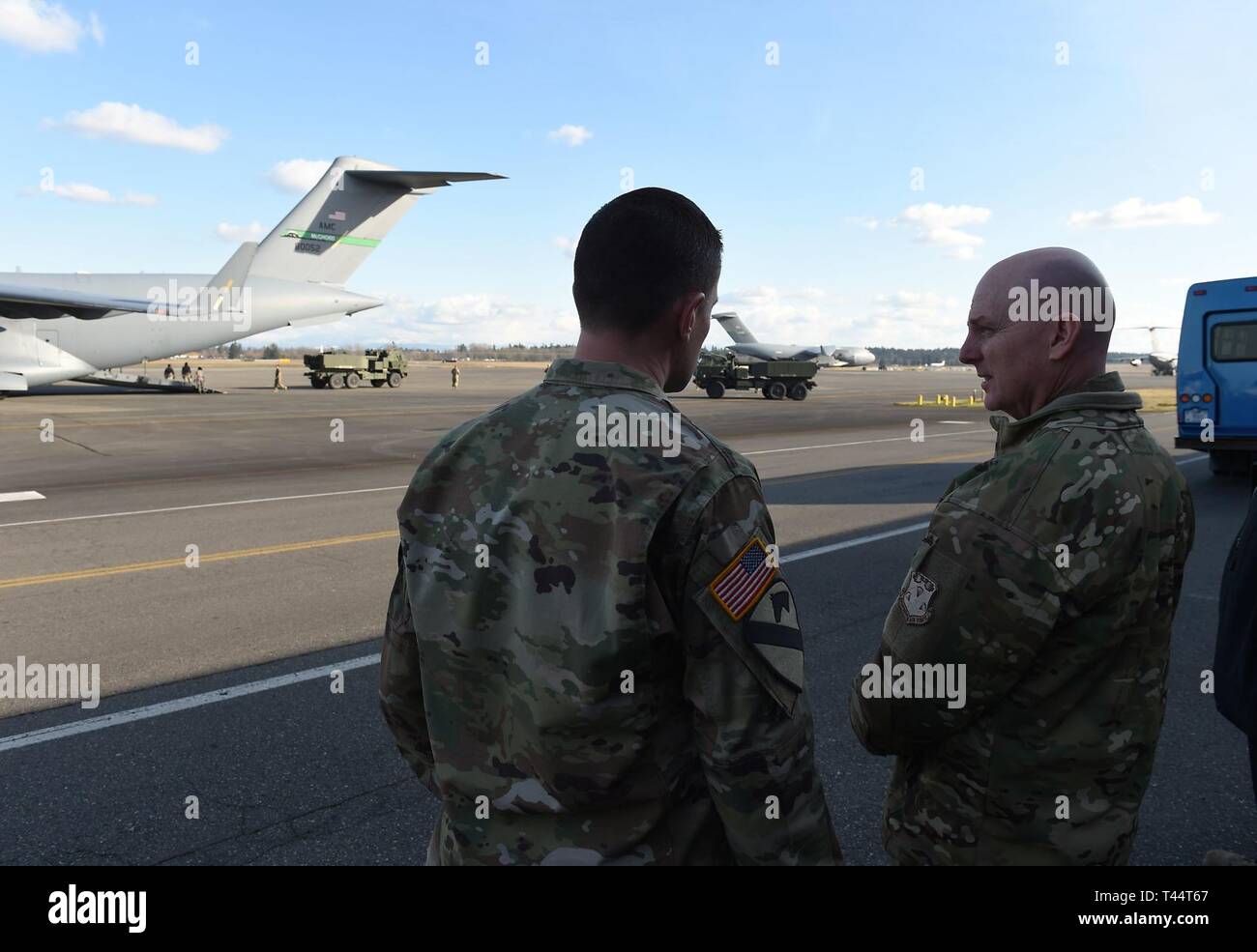 Maj. Gen. Sam Barrett, 18th Air Force commander, right, observes as U.S ...