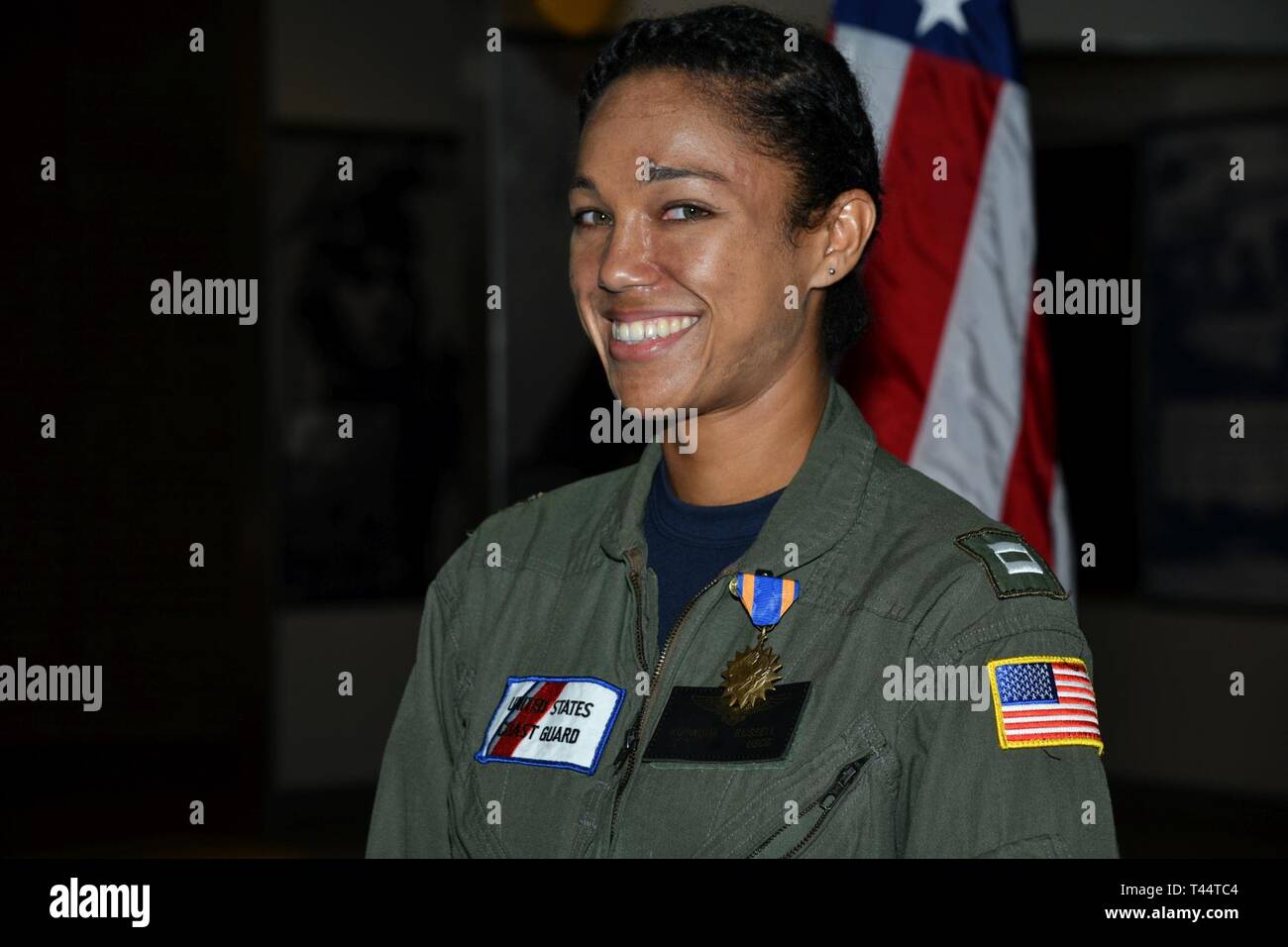 Vice Commandant of the Coast Guard Adm. Charles Ray awards Lt. Ronaqua ...