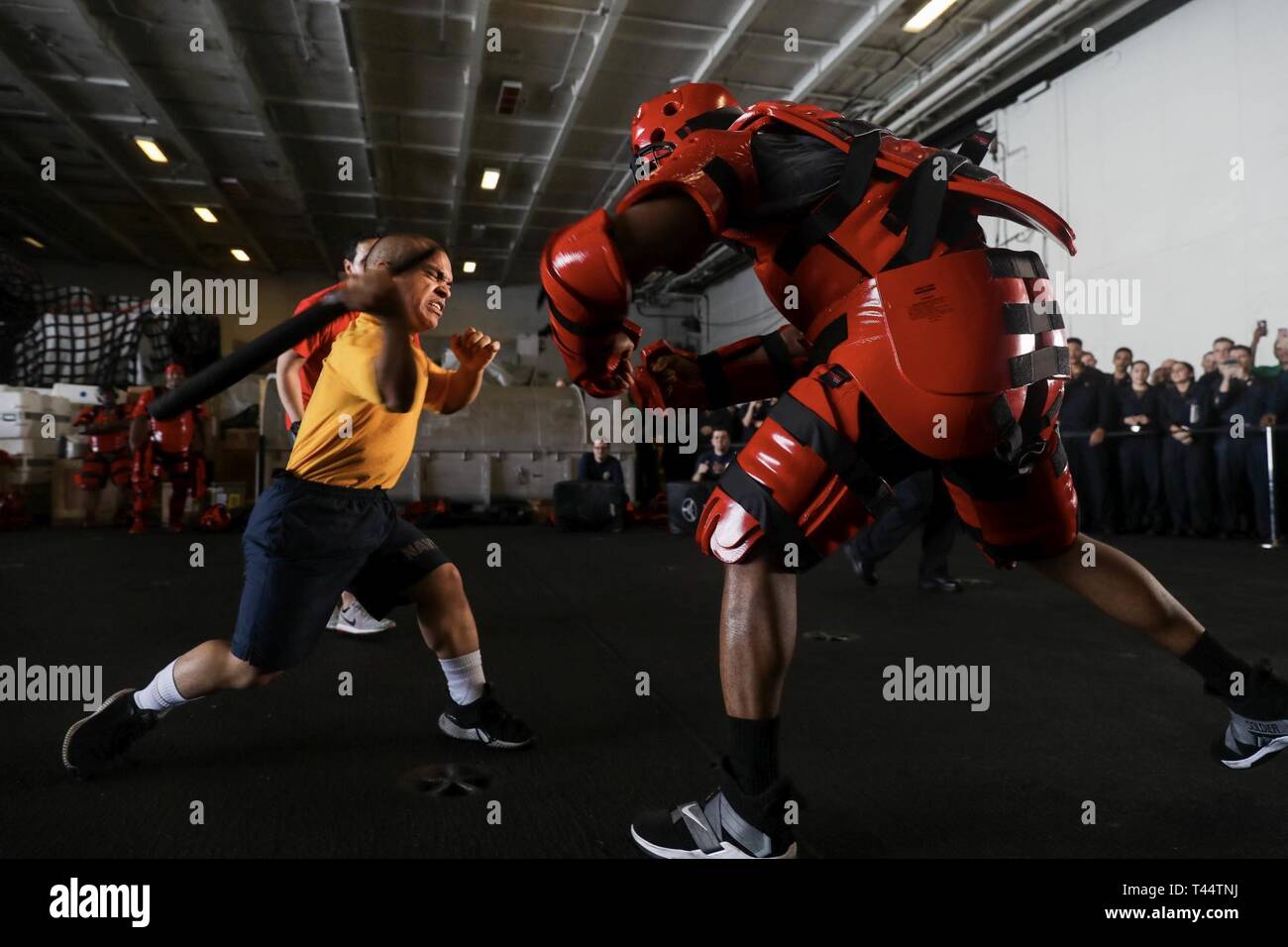 OCEAN (Feb. 22, 2019) Airman Justin Anaya (left) participates in a ...