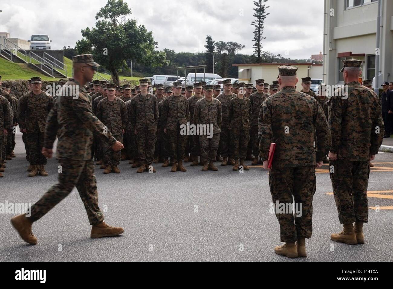 CAMP FOSTER, OKINAWA, Japan – Staff Sgt. Jonathan McClure marches to ...