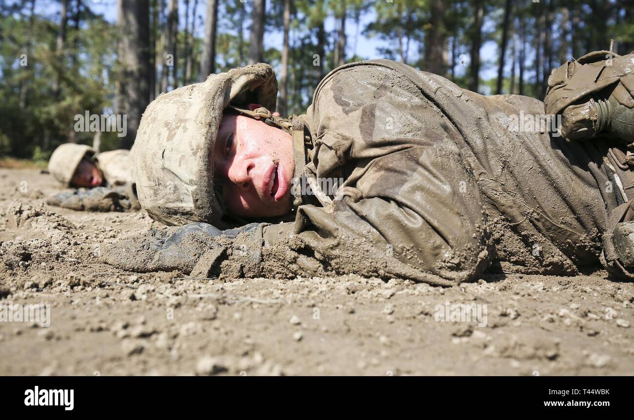 Recruit Deyraliz Perezgines completes obstacles during the Crucible at ...