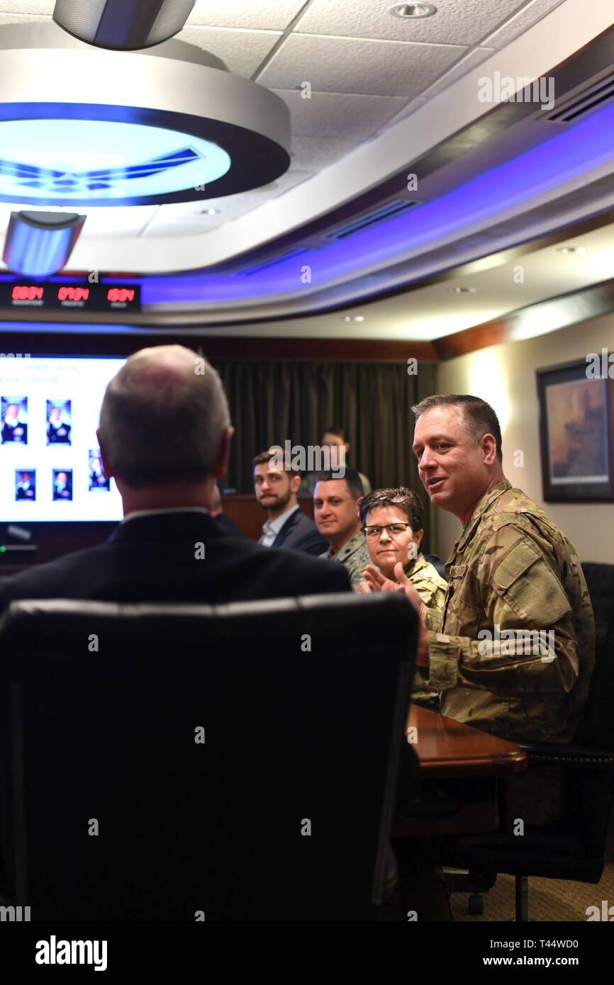 Col. Benjamin Spencer, 319th Air Base Wing commander, provides a ...
