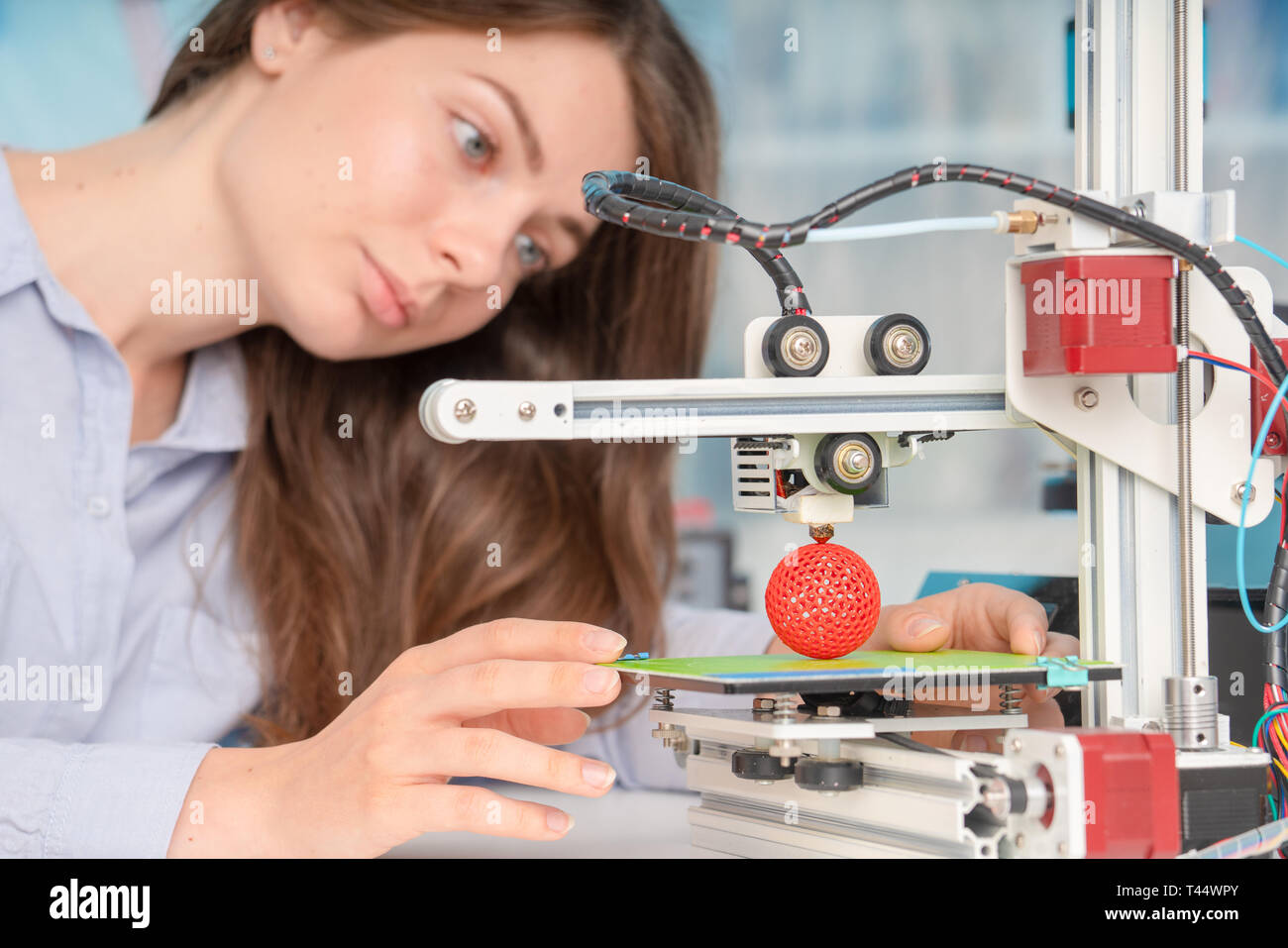 A student girl print prototype on 3D printer Stock Photo - Alamy