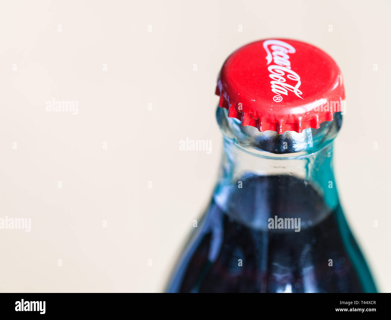 MOSCOW, RUSSIA - APRIL 4, 2019: top of closed Coca-Cola glass bottle ...