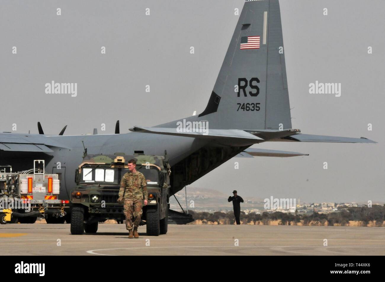 A U.S. Army Soldier offloads a Humvee at Nevatim Air Base, Israel, Feb ...
