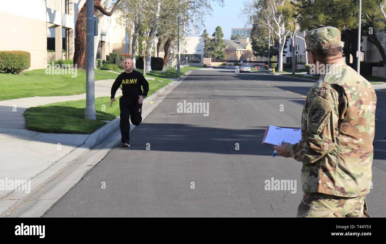 U.S. Army Sgt. Marco Rolon, left, human resources noncommissioned ...