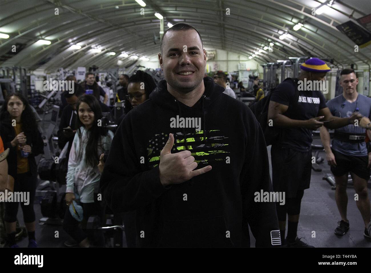 Spc. Benjamin Dean with the 300th Sustainment Brigade takes a picture ...