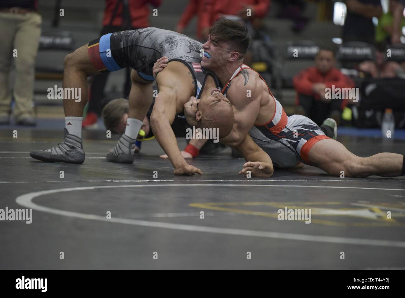 Marine 2nd lt. Terrence Zaleski of MCB Camp Lejeune, N.C. (in blue) fights the pin from Army Spc ...