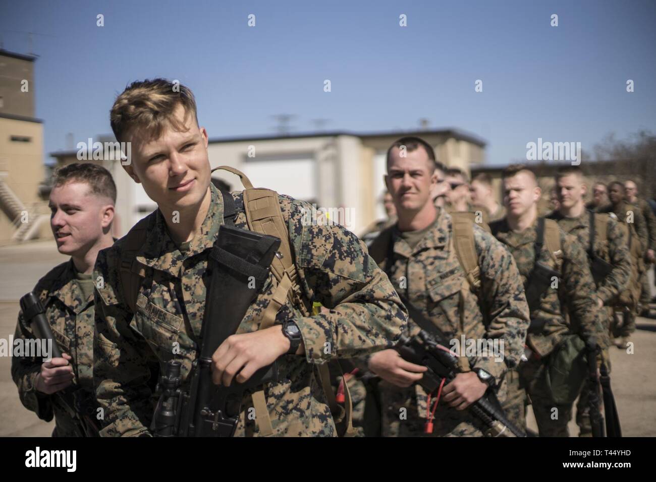 Marines from 14th Marine Regiment, 4th Marine Division standby to board ...