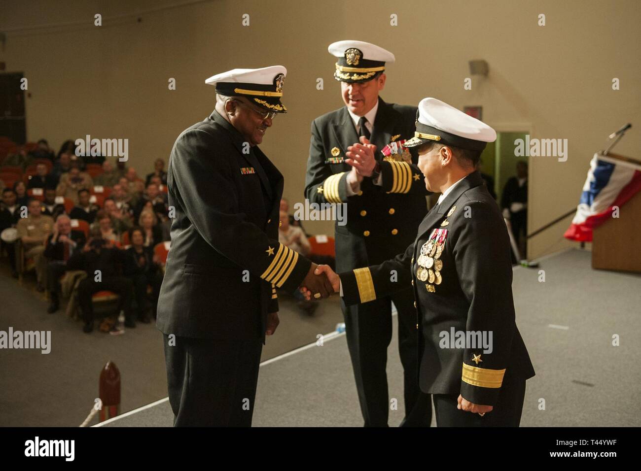 MILLINGTON, Tenn. (Feb. 25, 2019) Capt. Alonza Ross, left, receives ...