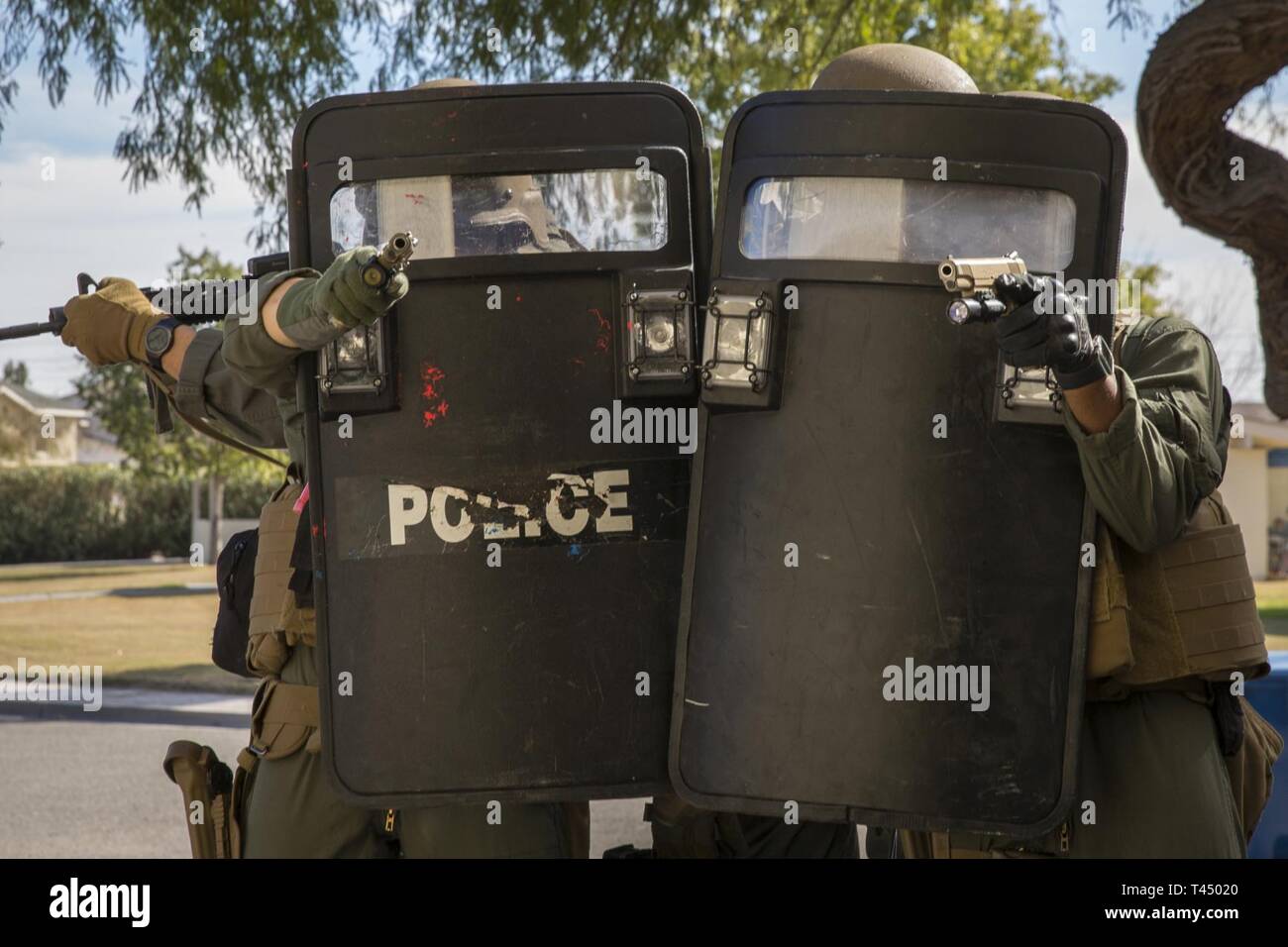U.S. Marines with the Provost Marshal's Office (PMO), Headquarters and ...
