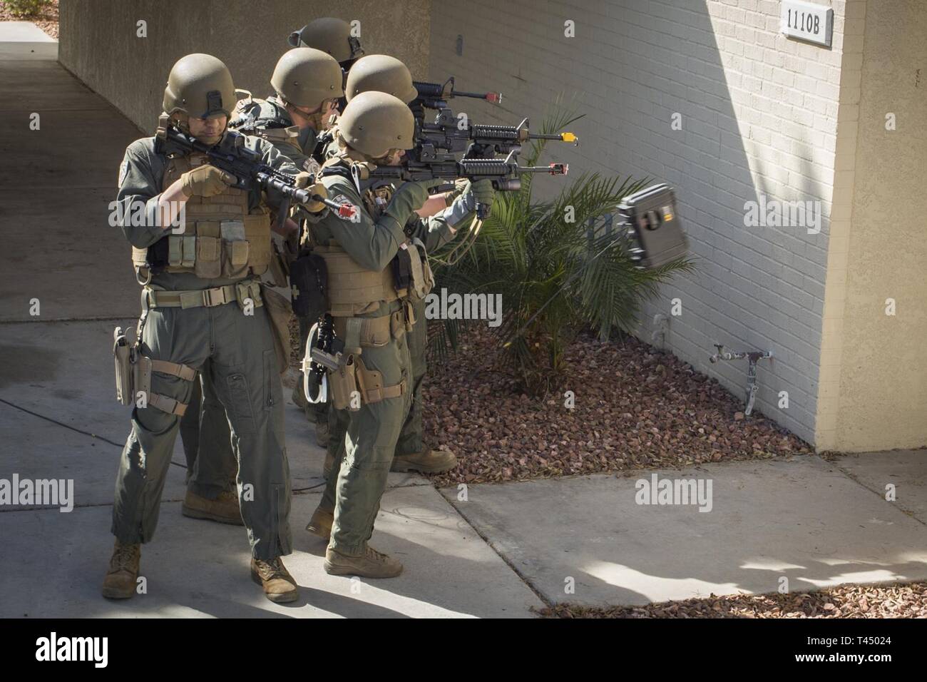 U.S. Marines with the Provost Marshal's Office (PMO), Headquarters and ...