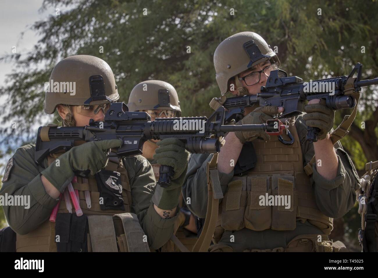U.S. Marines with the Provost Marshal's Office (PMO), Headquarters and ...