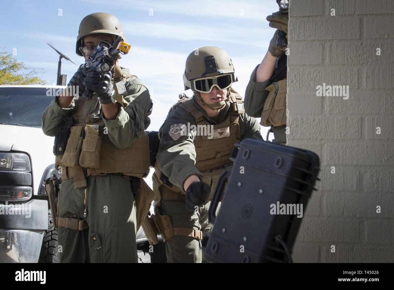 U.S. Marines with the Provost Marshal's Office (PMO), Headquarters and ...