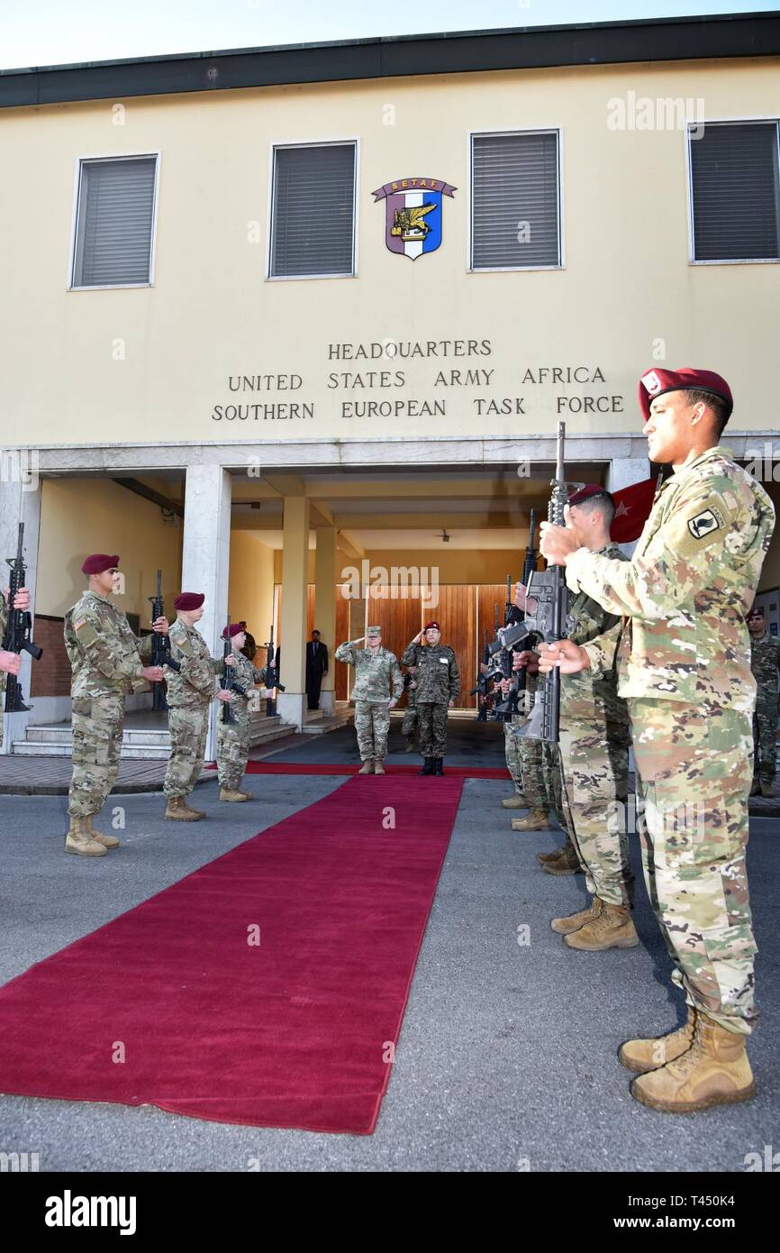 Maj. Gen. Roger L. Cloutier (left), U.S. Army Africa commanding general ...
