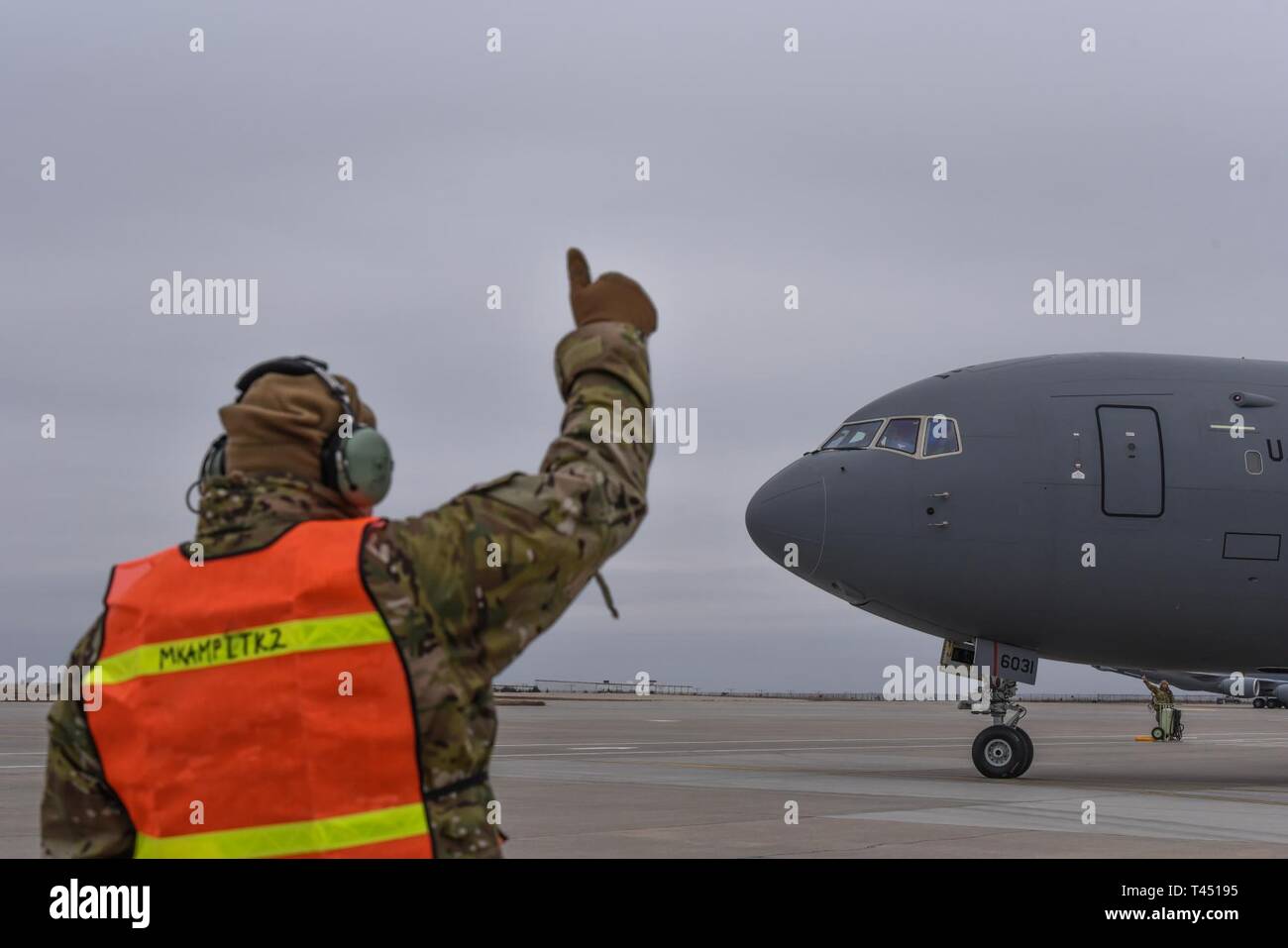 Master Sgt. John Grindstaff, 931st Air Refueling Wing crew chief, gives ...