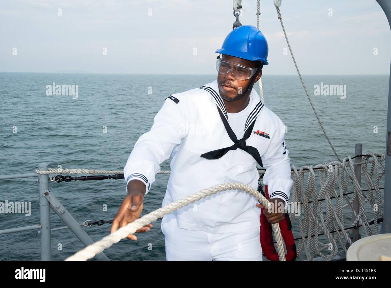 JAVA SEA (Feb. 26, 2019) Mineman 3rd Class Derrick Price, from Anaheim ...