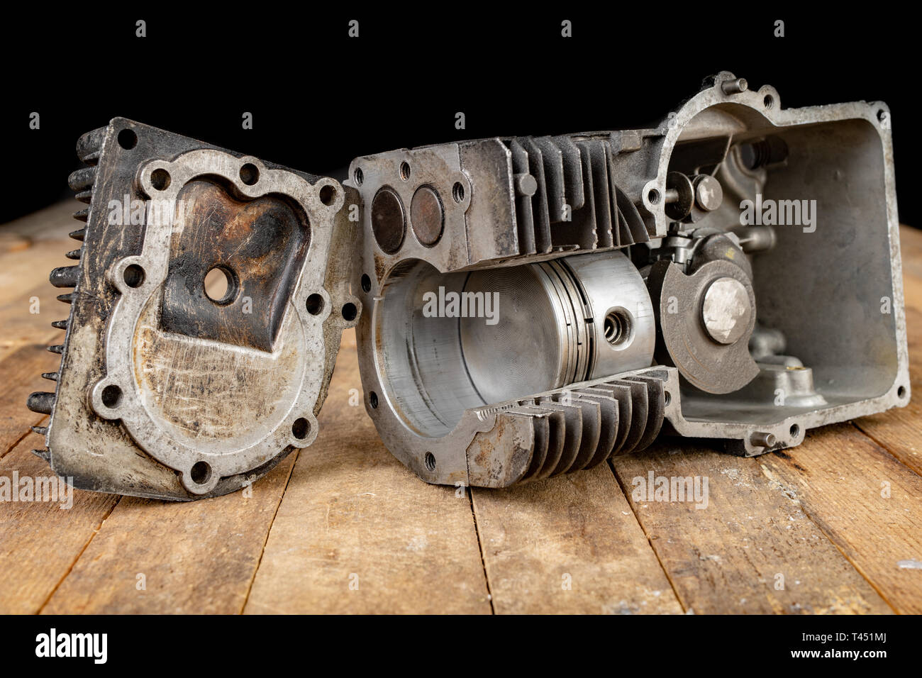 A four-stroke gasoline engine in section. The interior of a single ...