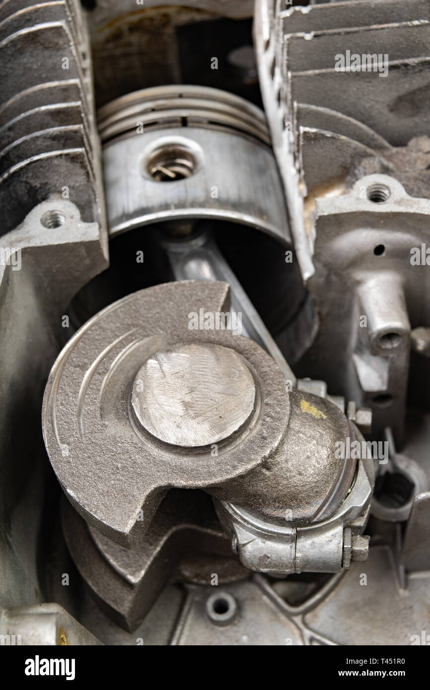 A four-stroke gasoline engine in section. The interior of a single ...
