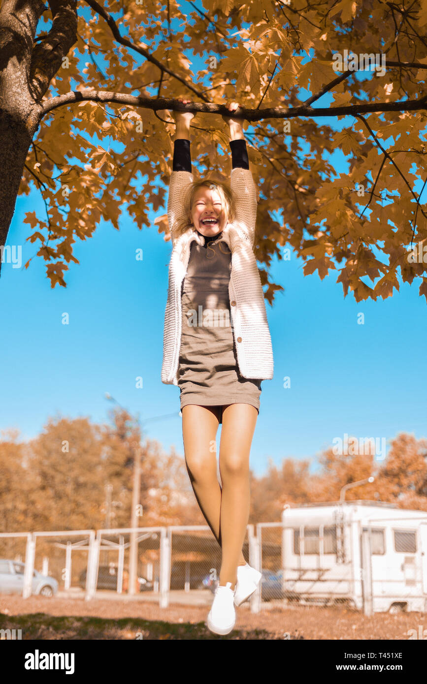 Child climb tree hi-res stock photography and images - Alamy