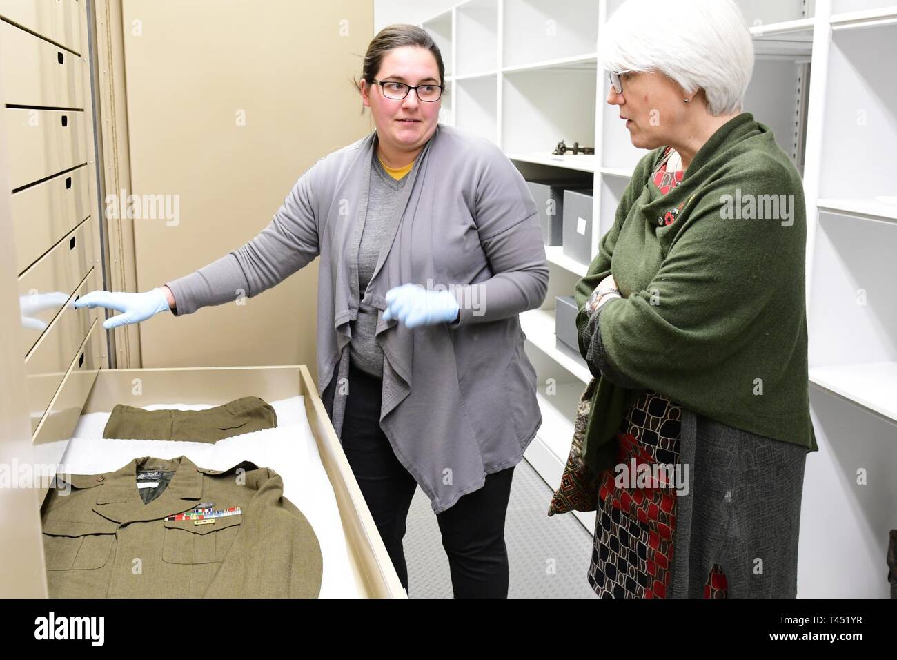 Amanda Morgan, General George Patton Museum technician, shows Helen ...