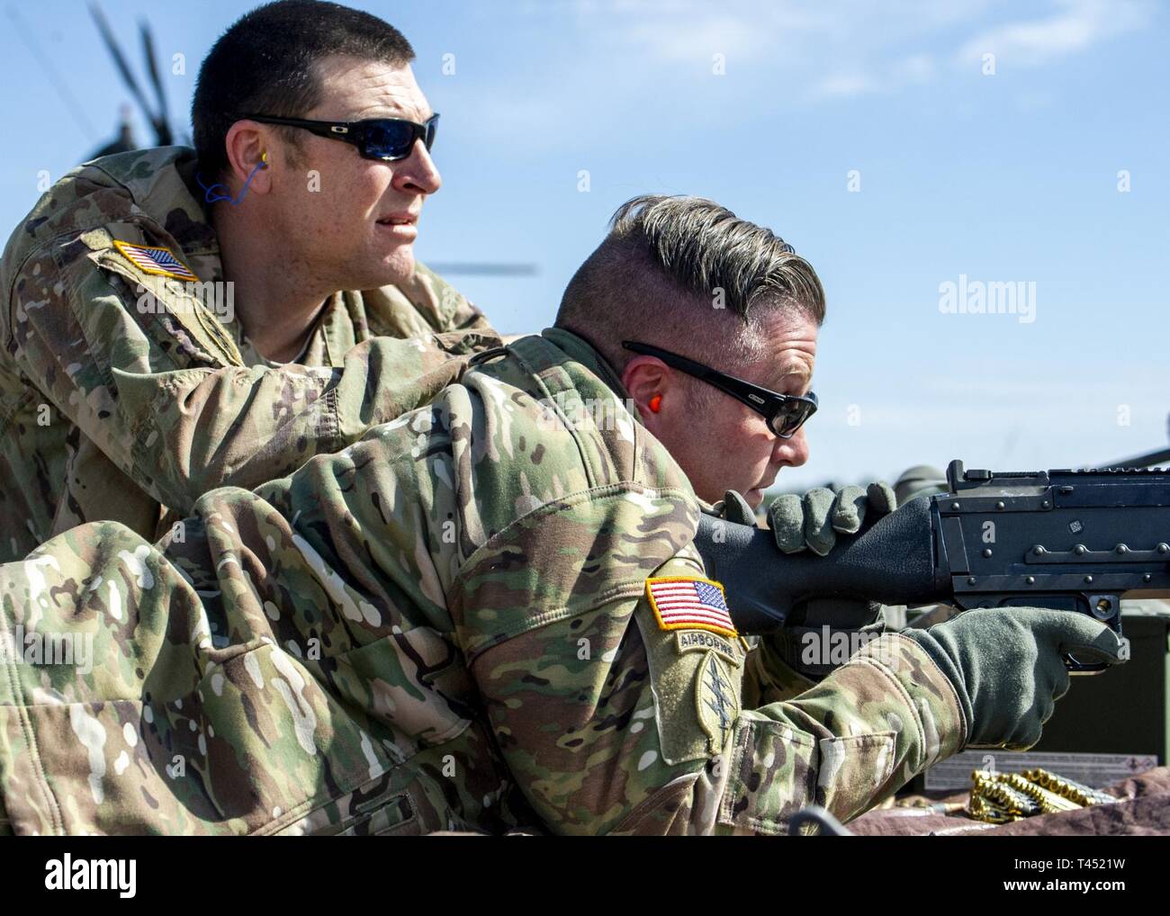 U.S. Army Chief Warrant Officer 2 Bohuslav Humplik fires the M240B ...