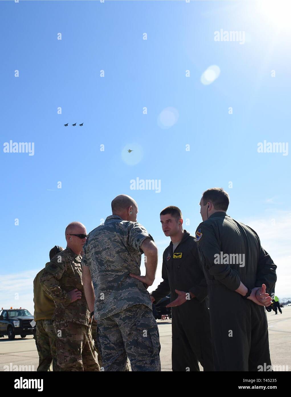 Gen. Mike Holmes, commander of Air Combat Command, center, and Chief ...