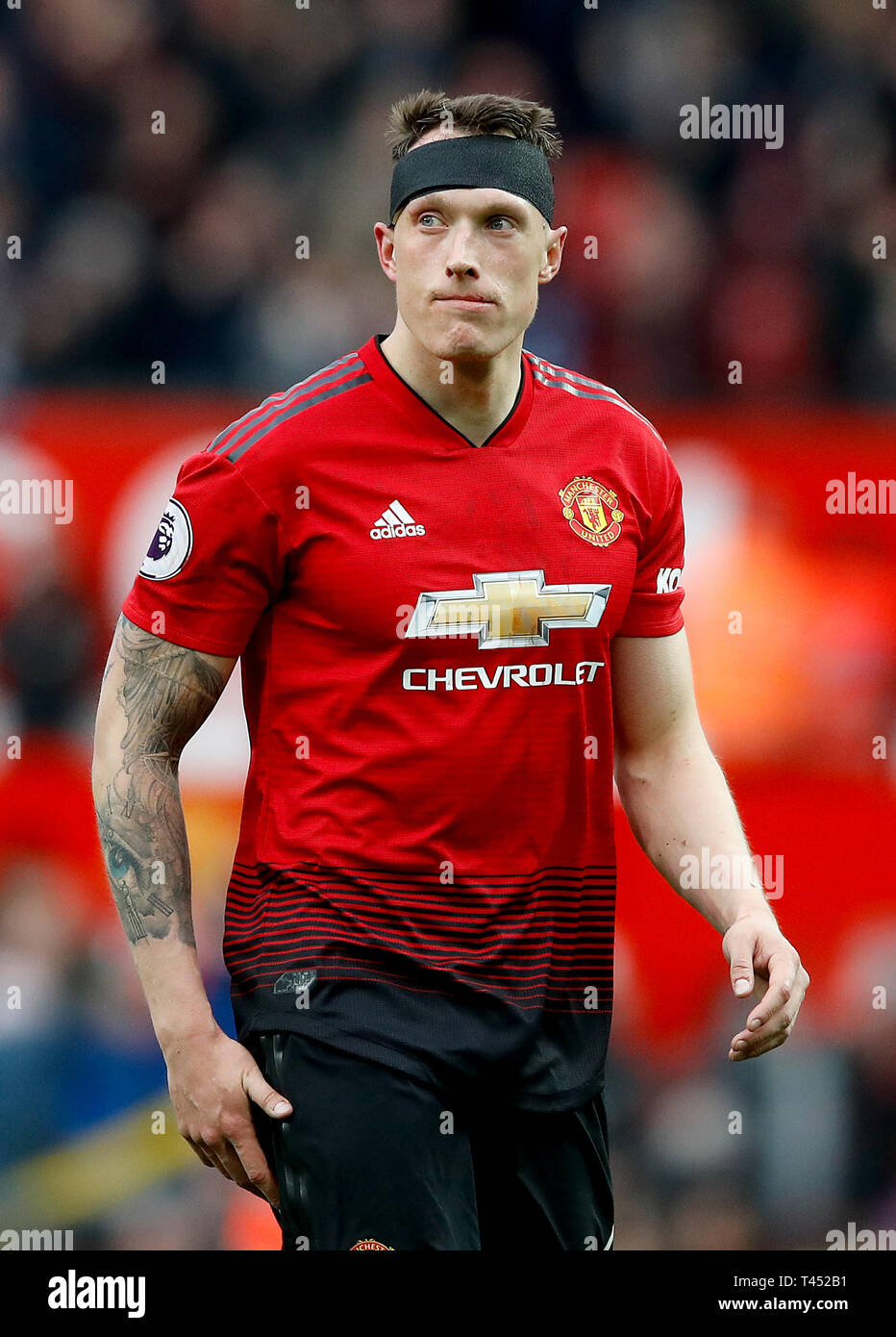 Manchester United's Phil Jones wears a bandage after his facial injury ...