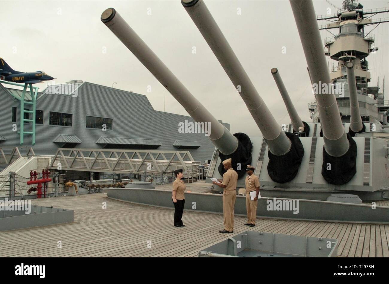 GM2(SW) Danielle D. Desiqueria, assigned to the Harpers Ferry Class ...
