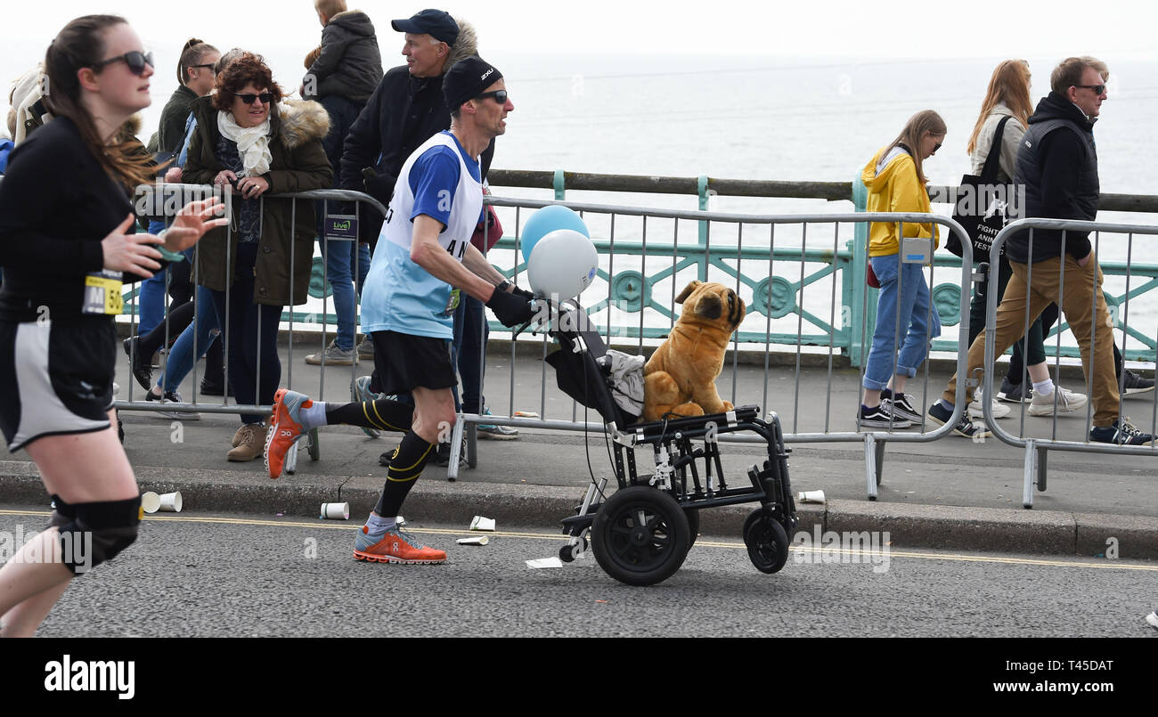Brighton UK 14th April 2019 - Thousands of runners some in fancy dress ...