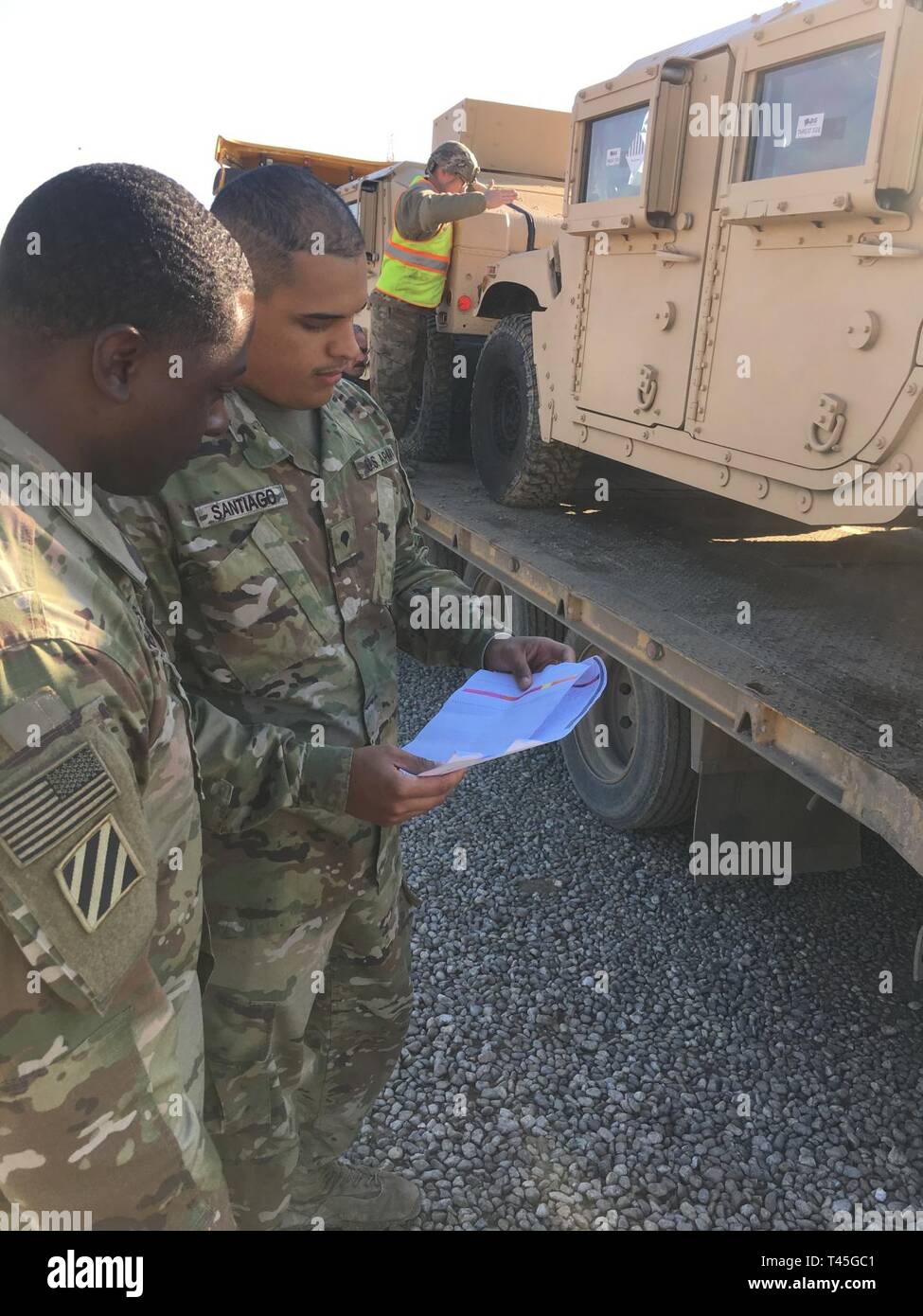 Sgt. 1st Class Raydeen Edwards and Spc. Tristan Santiago, 620th ...