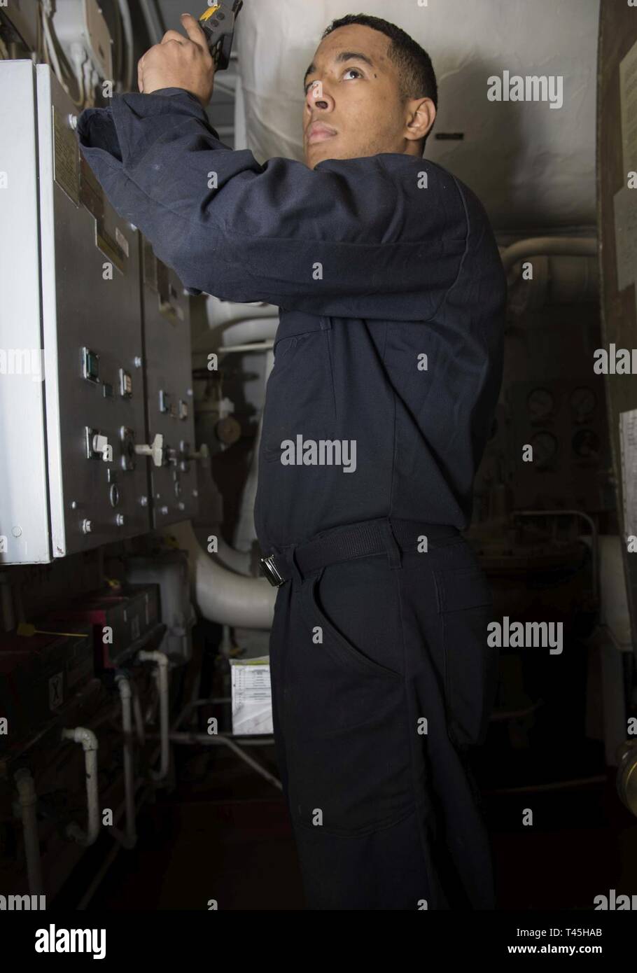 OCEAN (Feb. 25, 2019) Damage Controlman 3rd Class Junior Villamizar man ...