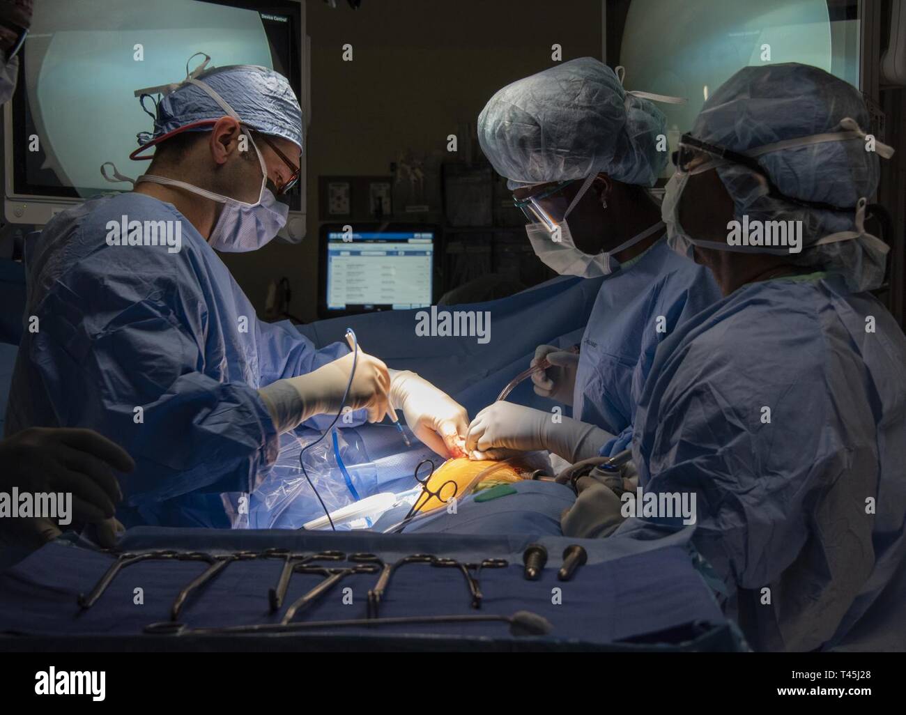 Lt. Col. (Dr.) Shae Pribyl, left, cardiothoracic surgeon, Dr. Saudra ...
