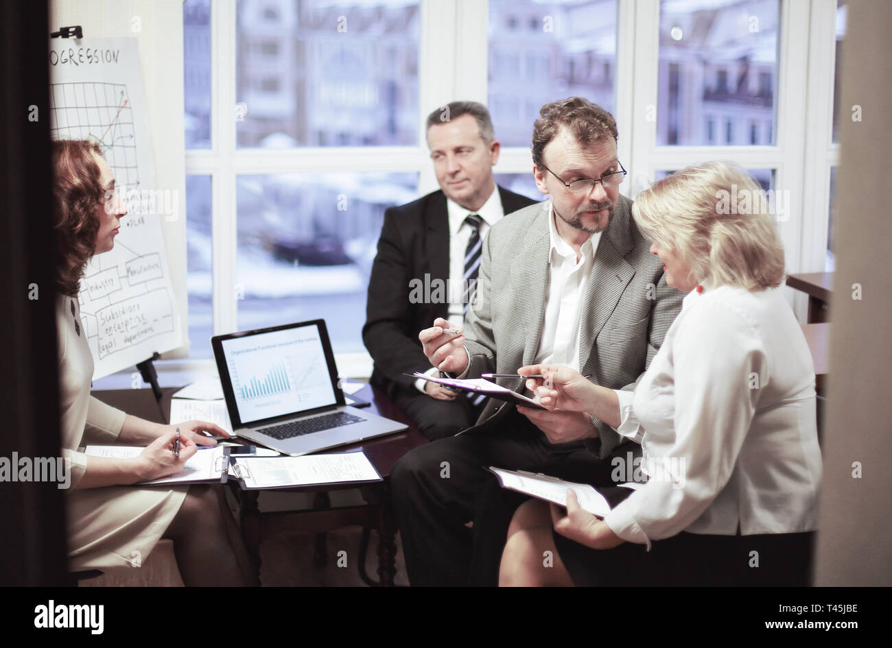 business partners discussing contract terms in office .business concept ...