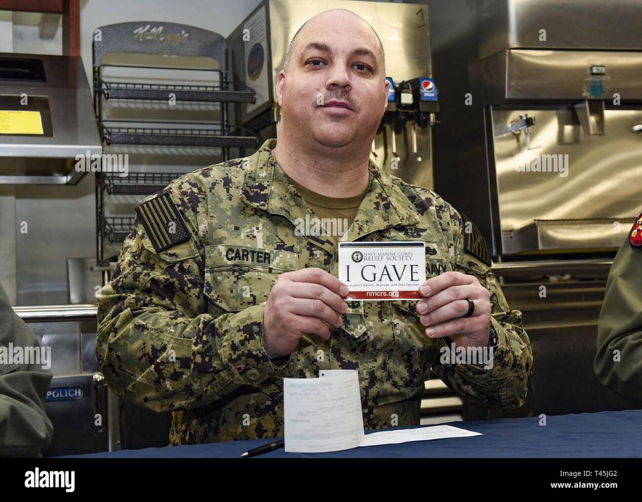 NORFOLK, Va. (Feb. 28, 2019) Command Master Chief Jonas Carter poses ...