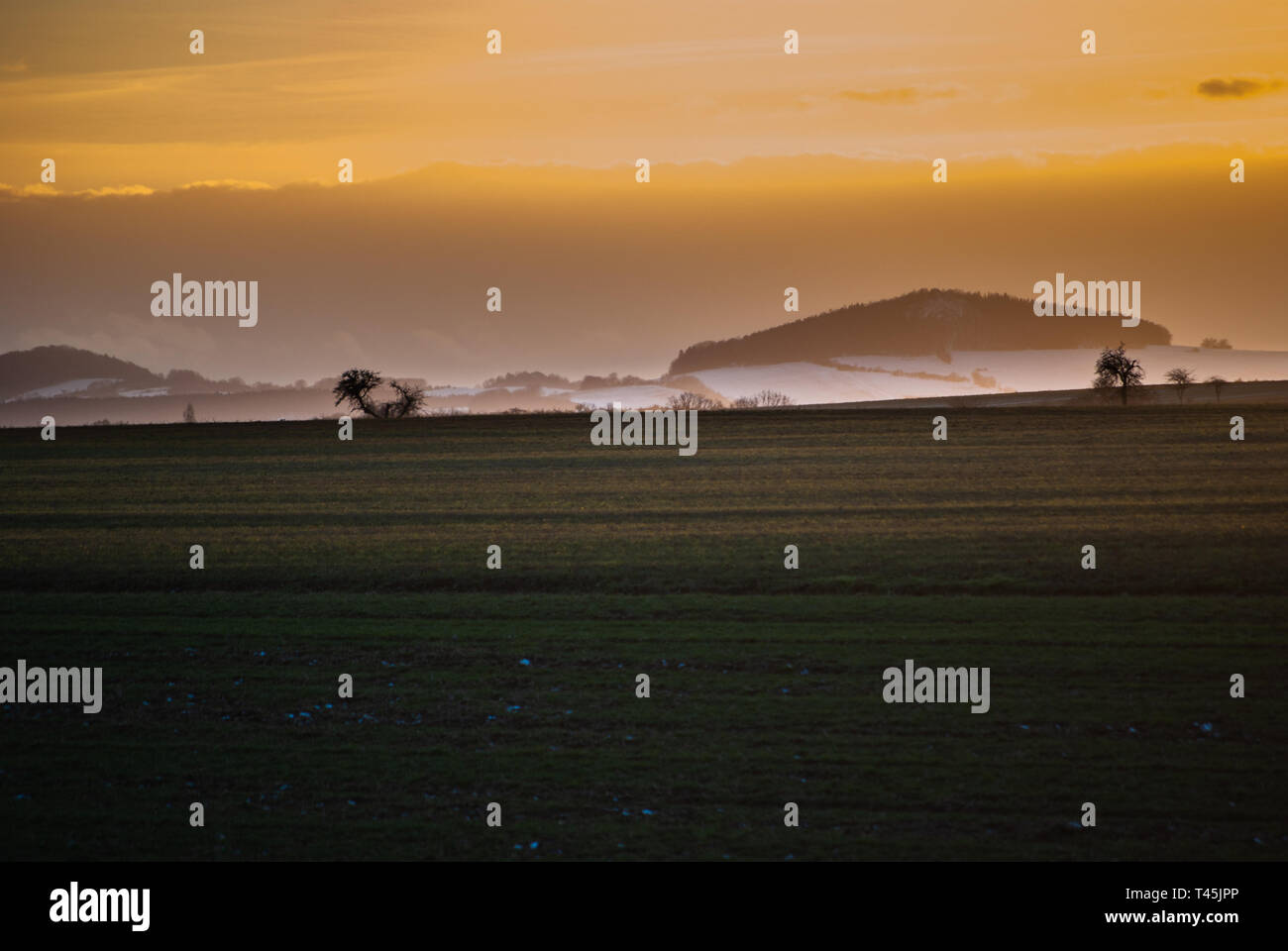 sunset behind a hill in upper lusatia Germany Stock Photo - Alamy