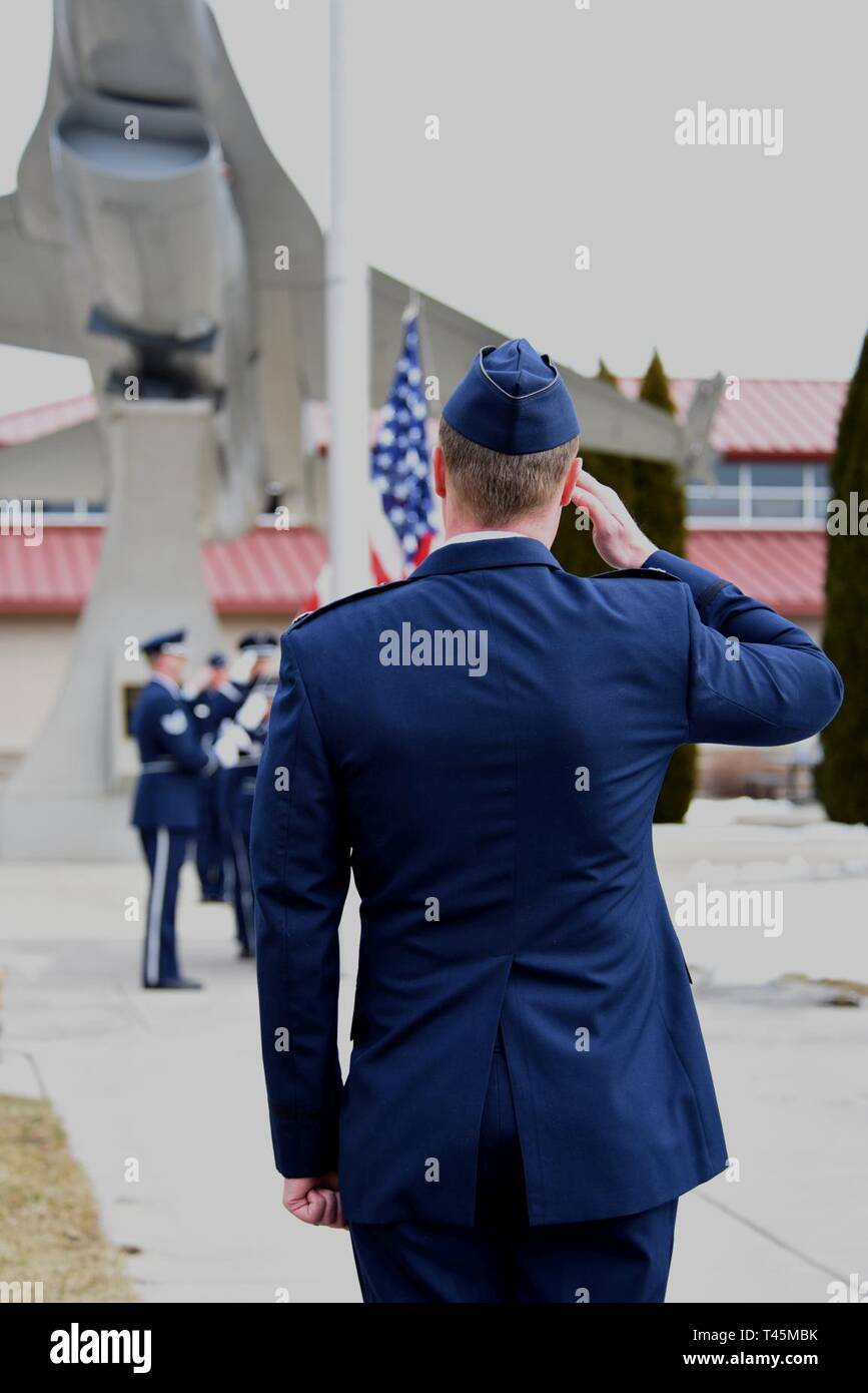 U.S. Air Force Lt. Col. Eric Haas, 550th Fighter Squadron, salutes ...