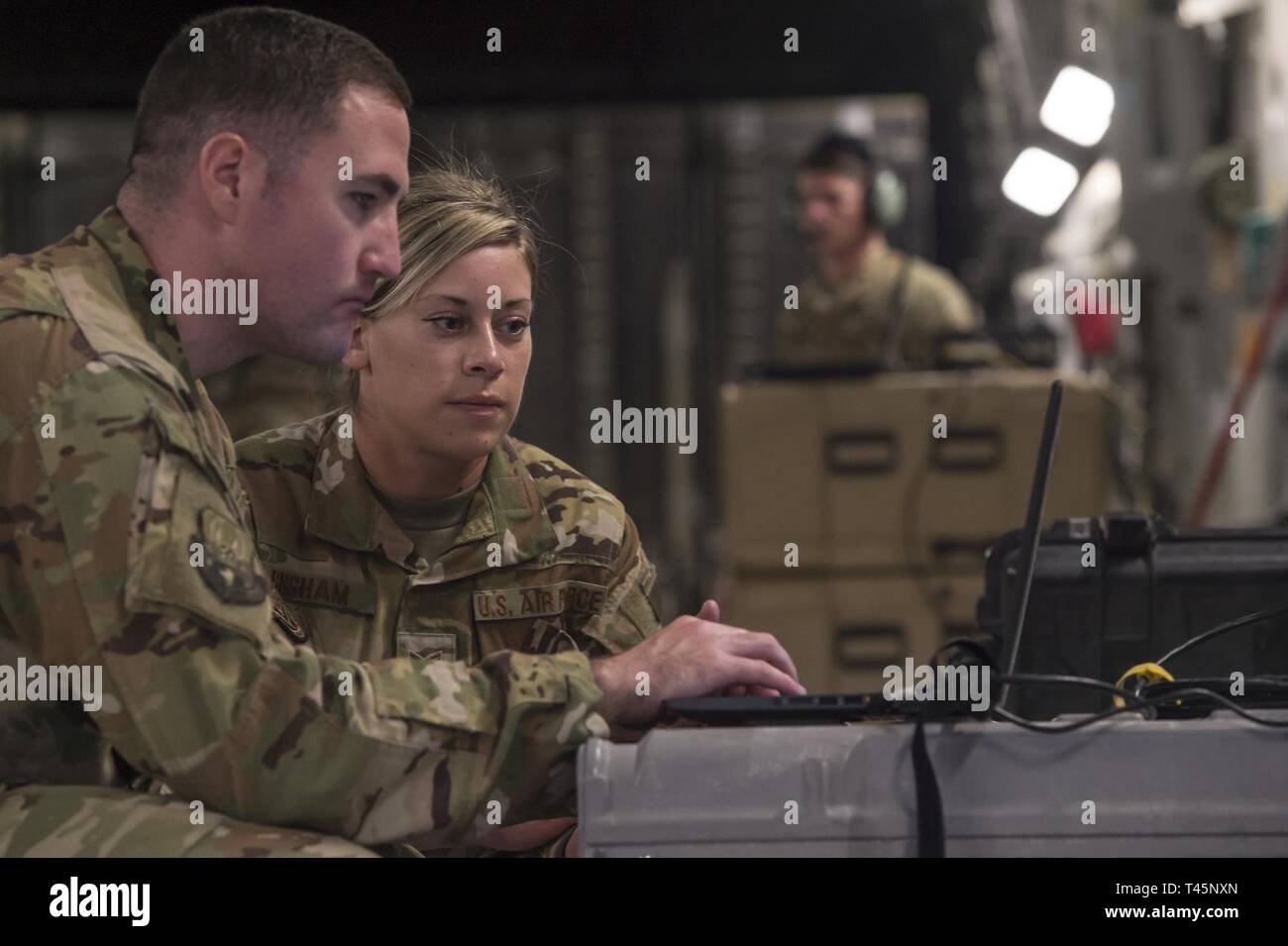 Tech. Sgt. Jason Snell, left, and Staff Sgt. Heather Bingham, both ...