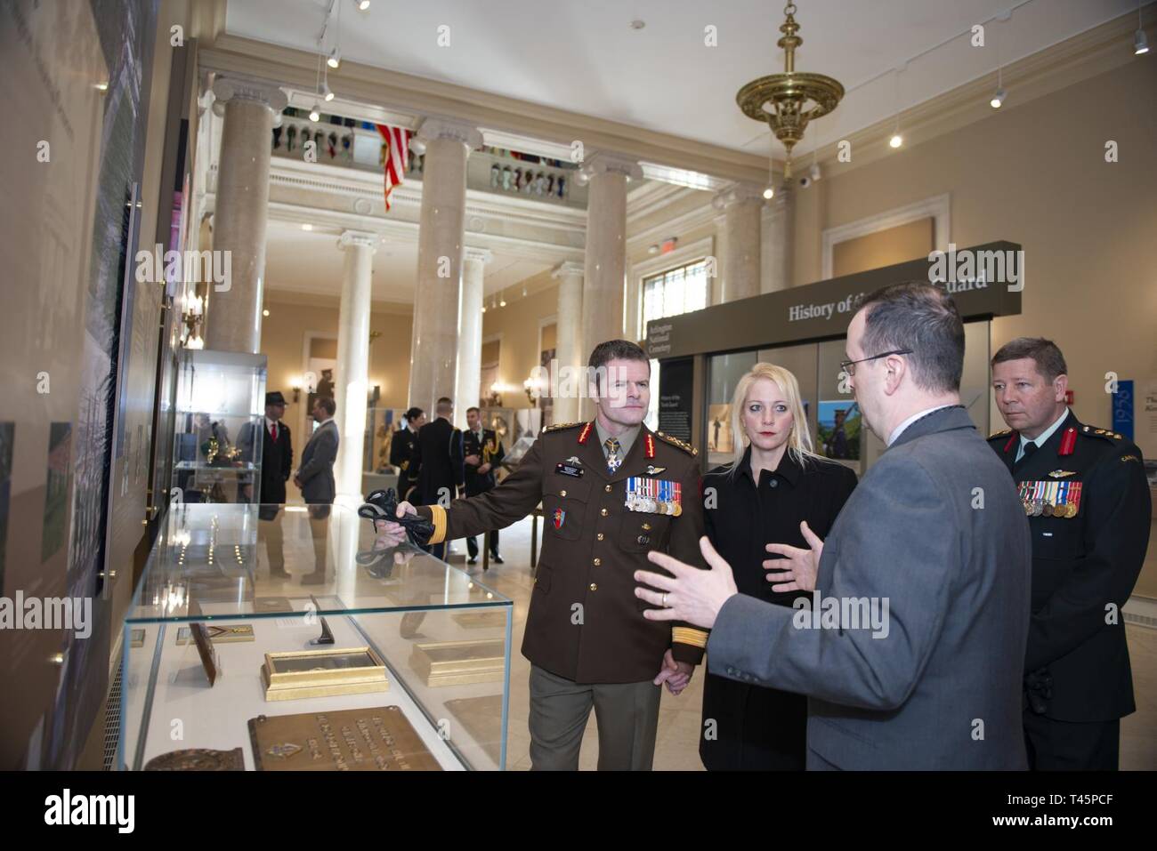Tim Frank (center right), historian, Arlington National Cemetery; gives ...