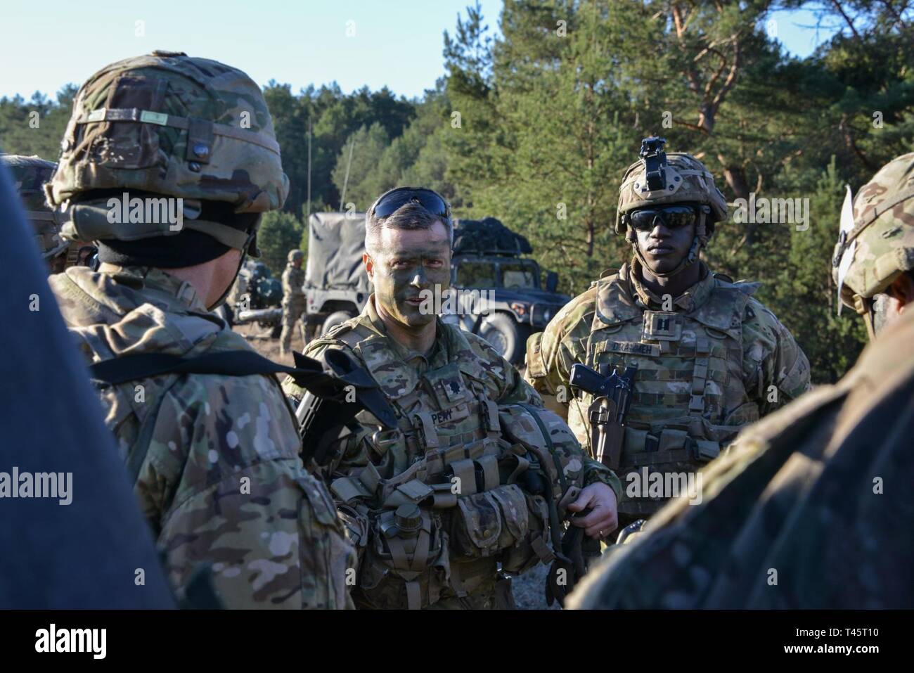 U. S. Army Lt. Col. James H. B. Peay IV, center, the commander of the ...
