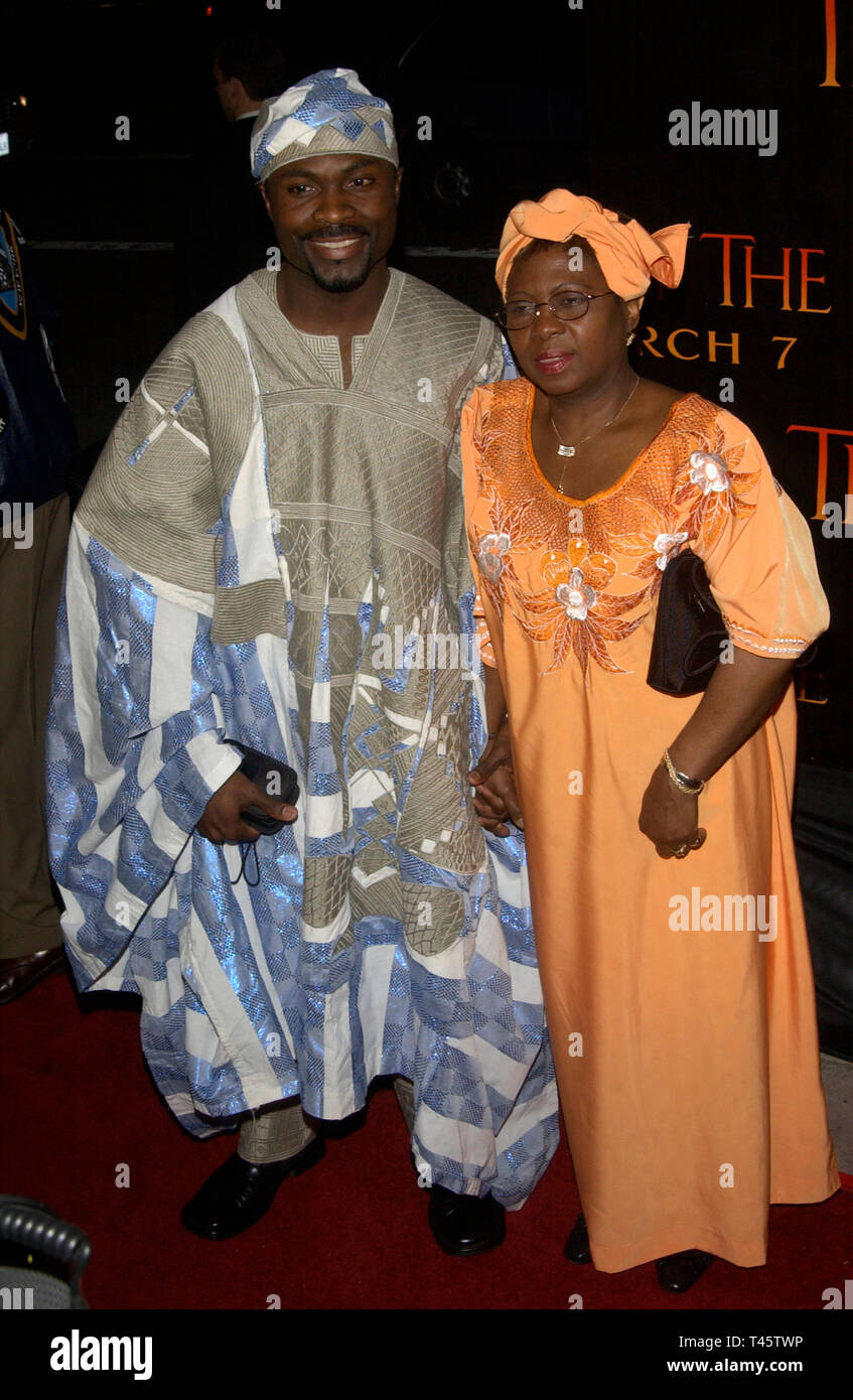 LOS ANGELES, CA. March 03, 2003: Actor AWAOVIEYI AGIE & mother at the ...