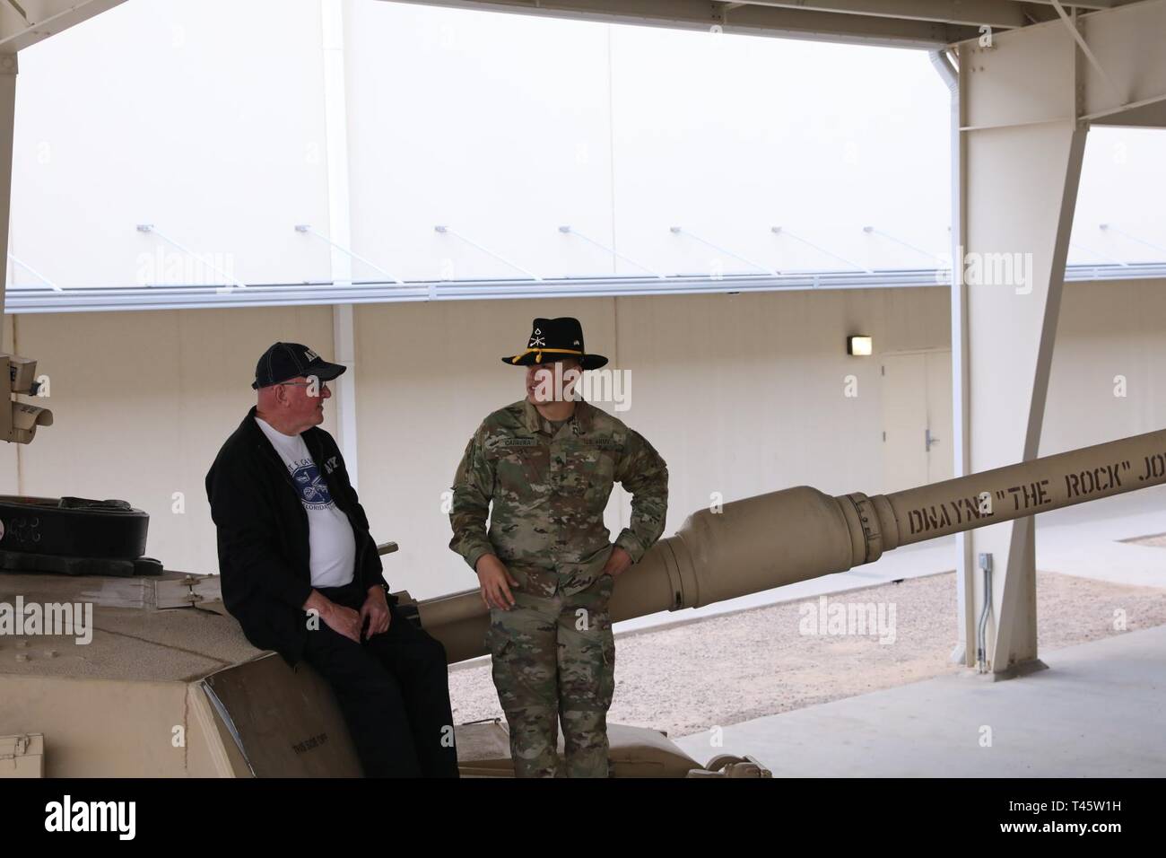 Soldiers with 1st Squadron, 1st Cavalry Regiment discuss history with a ...