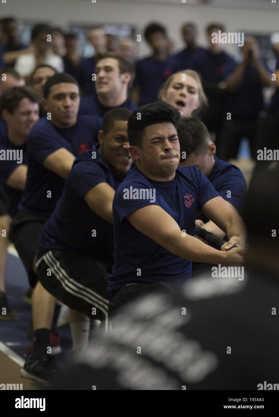 Members of the U.S. Marine Corps Delayed Entry Program pull a rope ...
