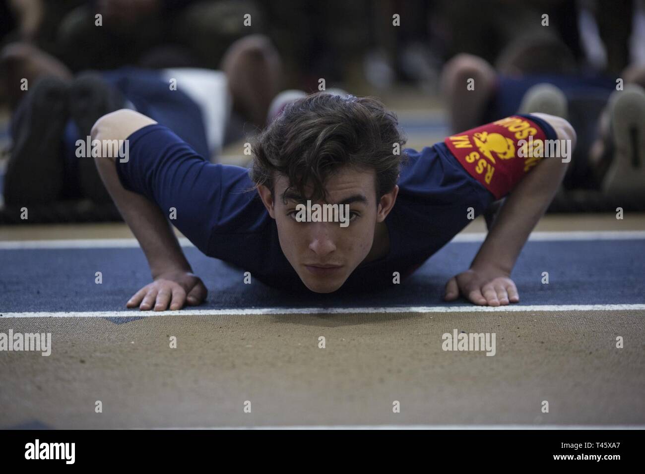 A member of the U.S. Marine Corps Delayed Entry Program prepares to ...