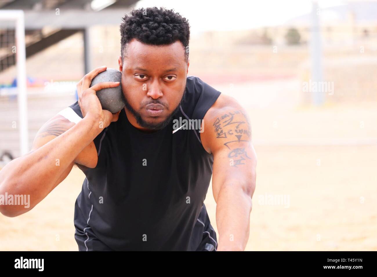 U.S. Army veteran Charles Hightower is fully focused on his first throw ...