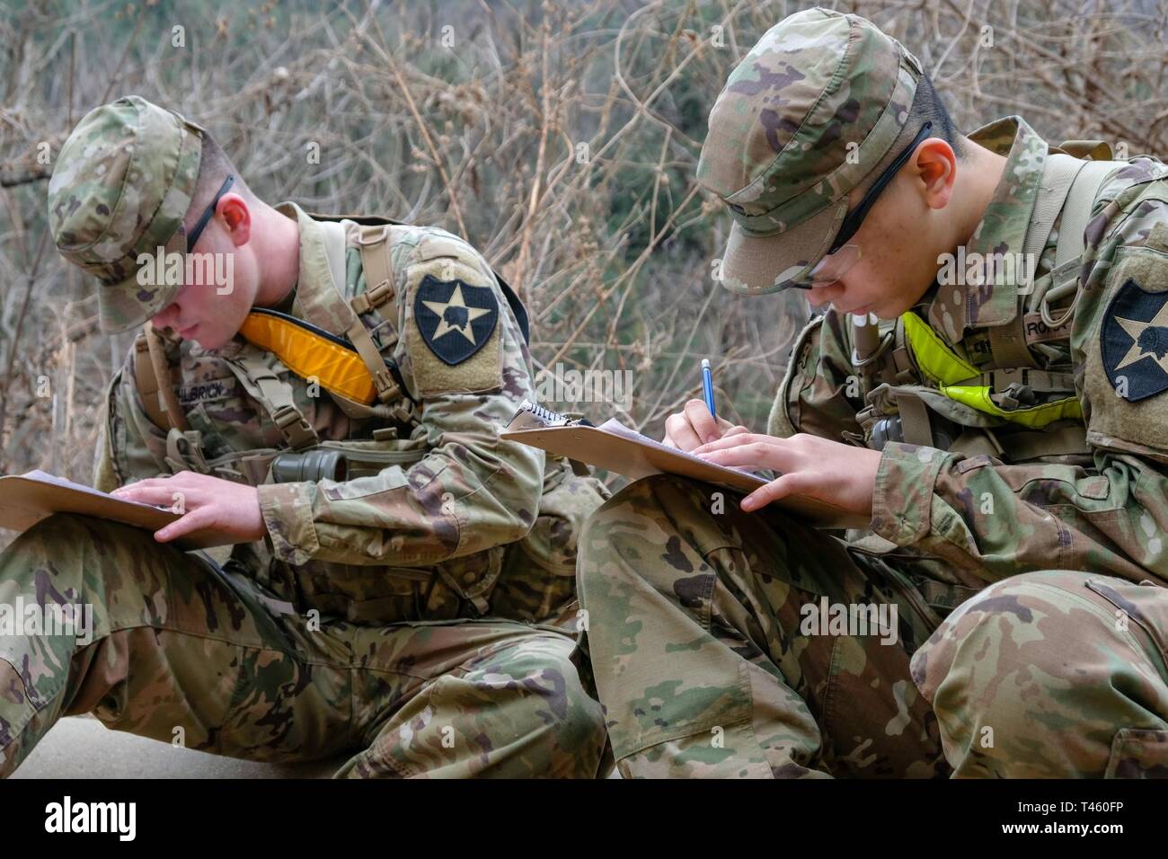 Pvt. Joseph Philbrick, left, multiple launch rocket system (MLRS/HIMARS ...