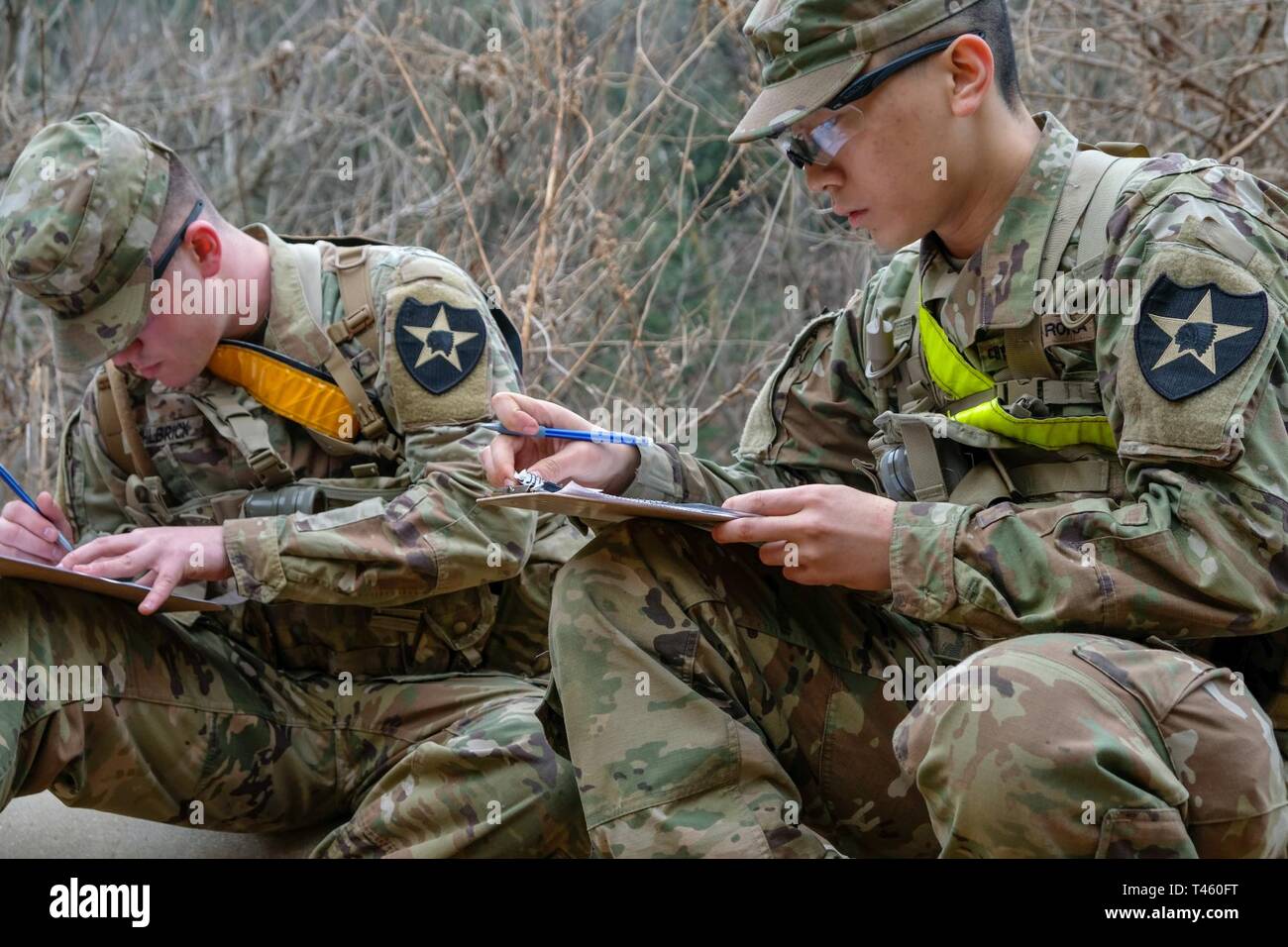 Pvt. Joseph Philbrick, left, multiple launch rocket system (MLRS/HIMARS ...